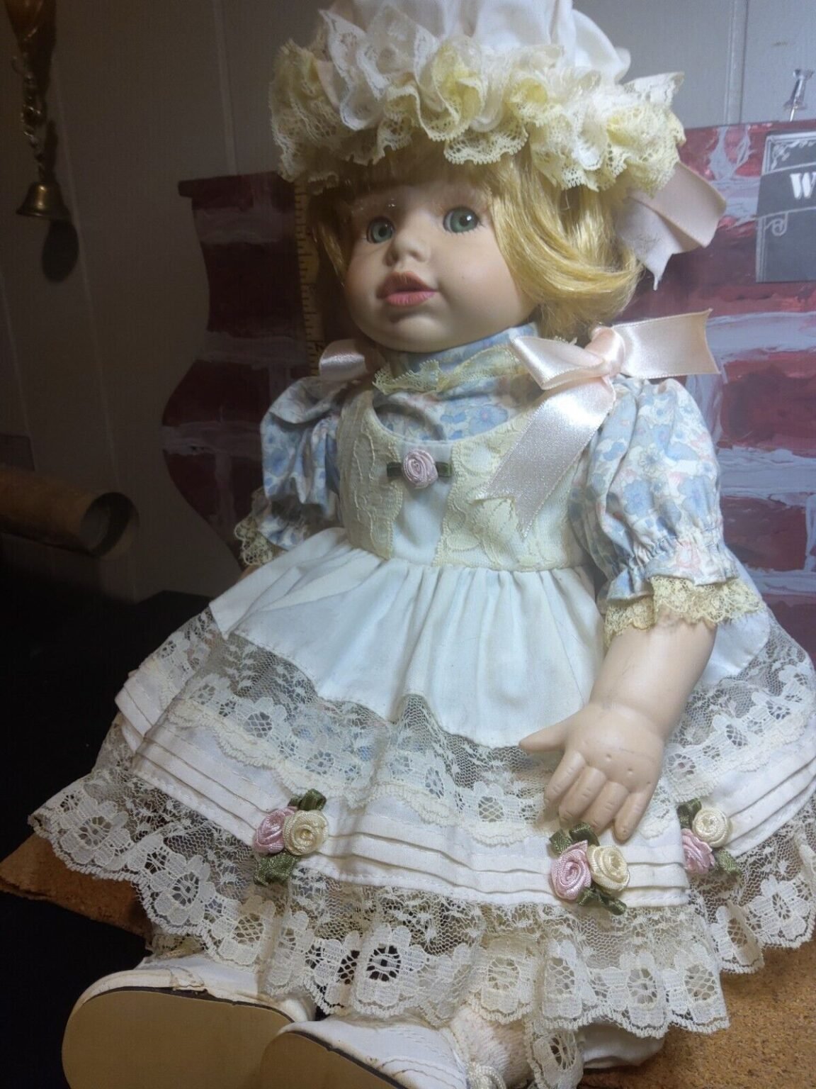 Porcelain Sitting Baby Doll With Bonnett – 101bids